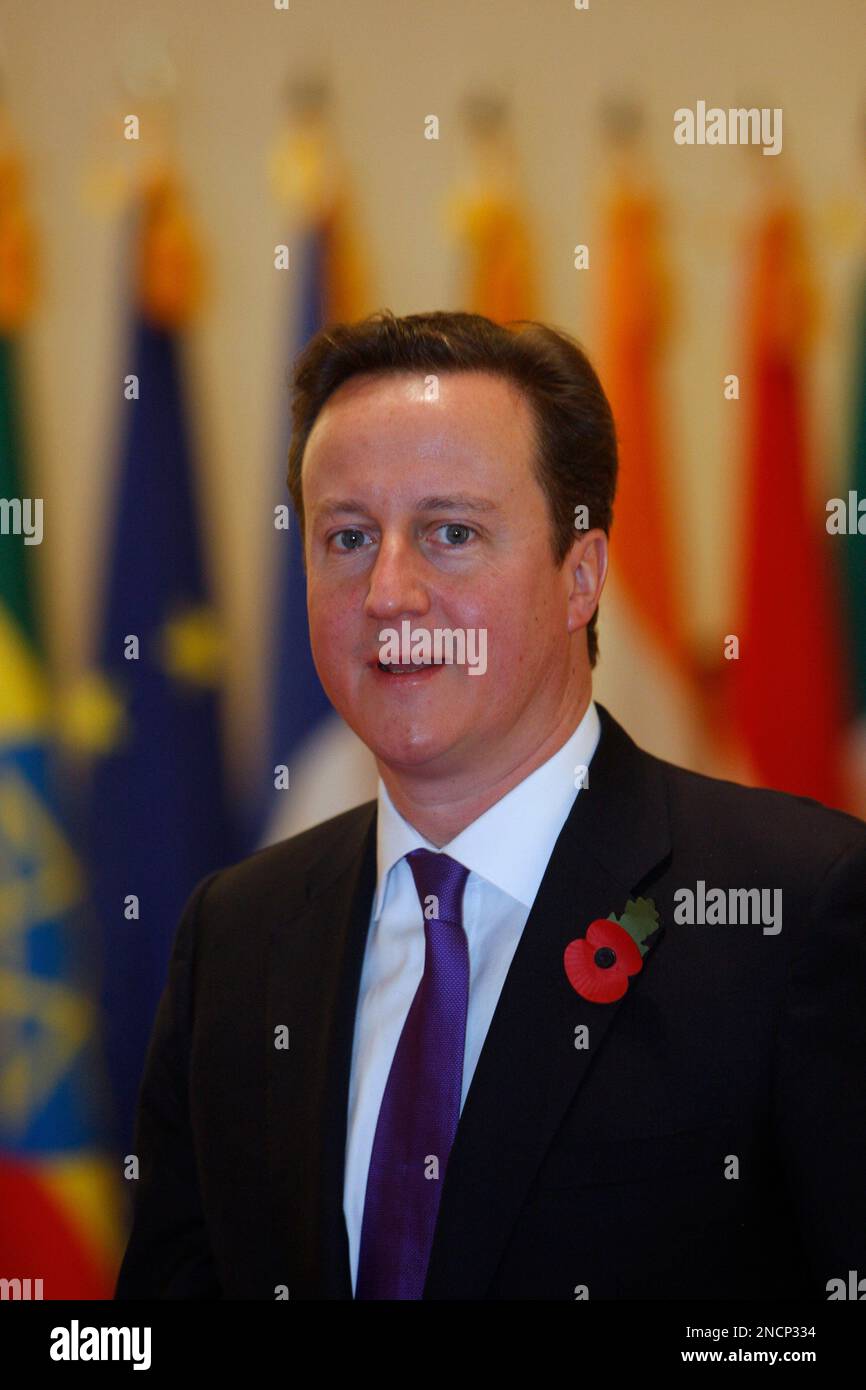Britain's Prime Minister David Cameron arrives for the opening plenary ...