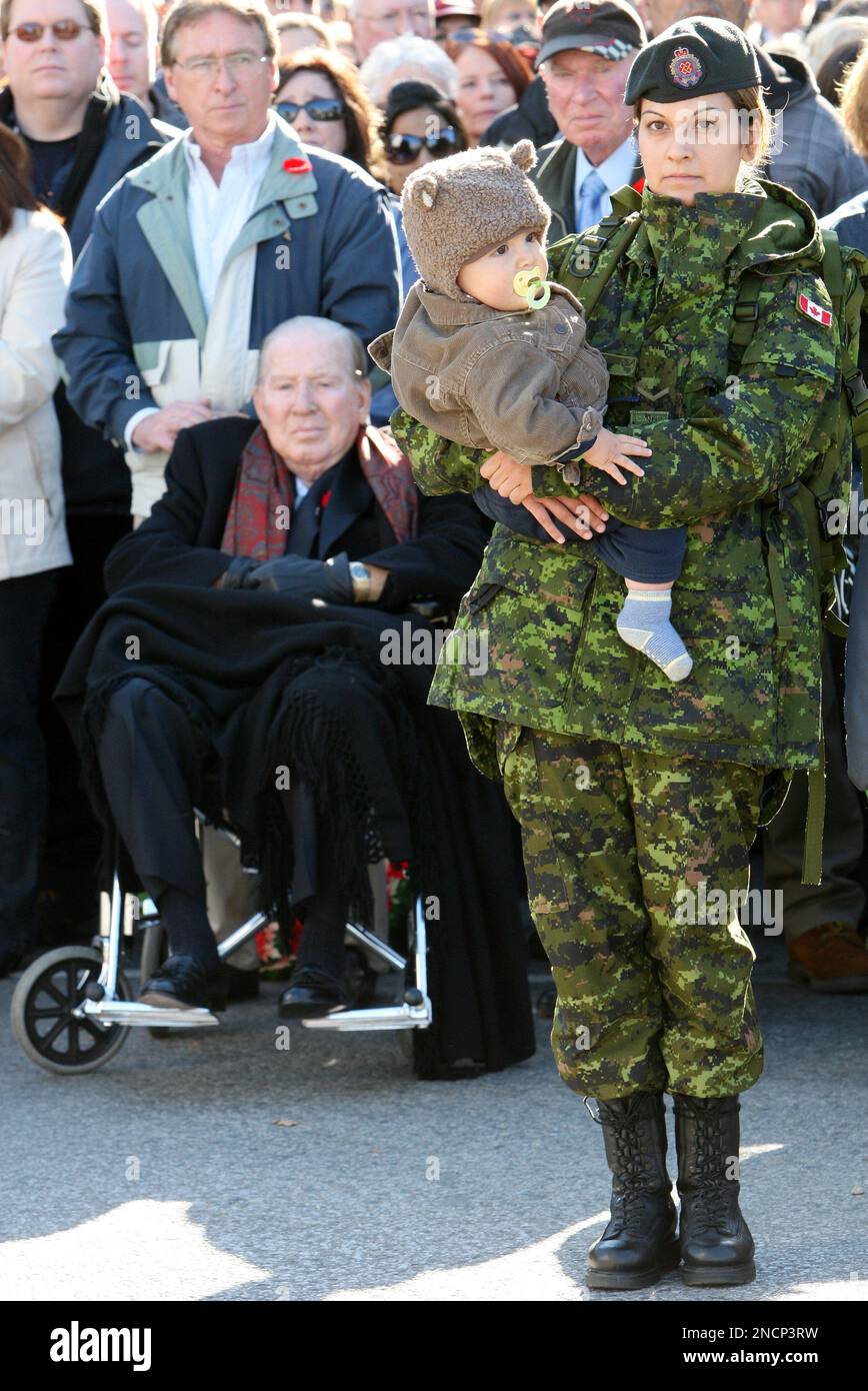 Pte. Sabrina Ryan, 25, from CFB Petawawa holds her son Ethan, in front ...