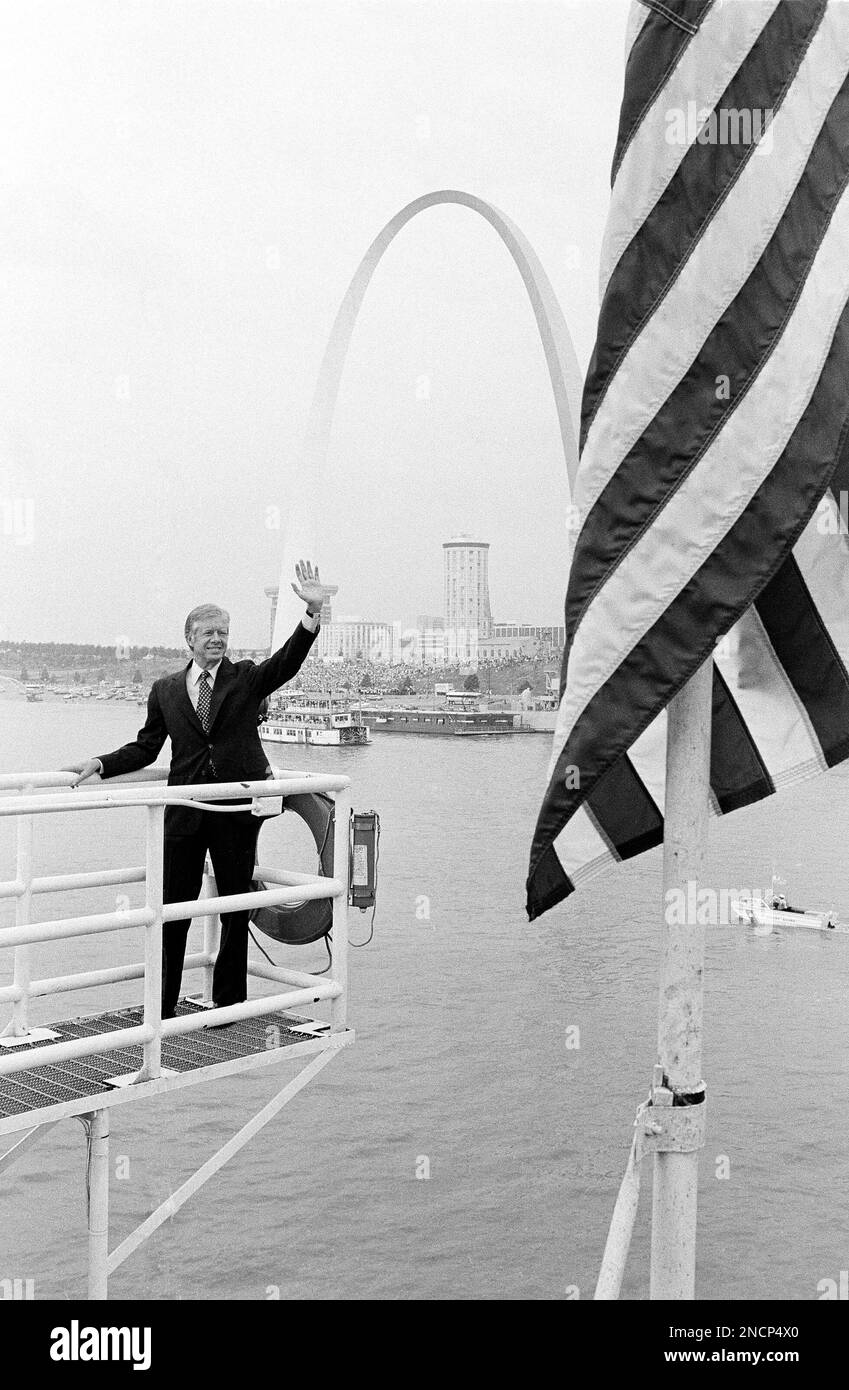 U.S. President Jimmy Carter waves from the Delta Queen as the river ...