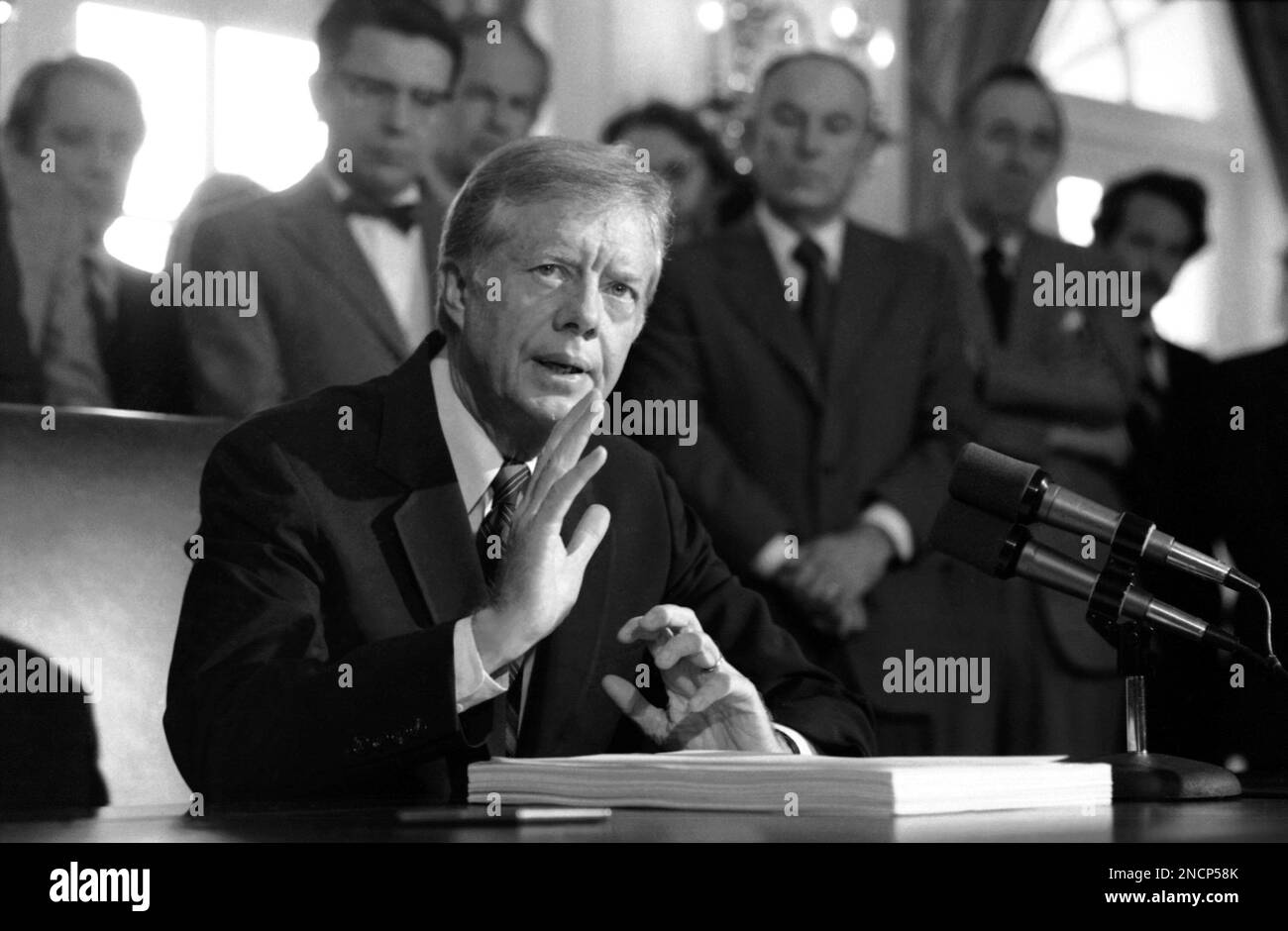 President Jimmy Carter speaks to reporters before signing the Omnibus ...