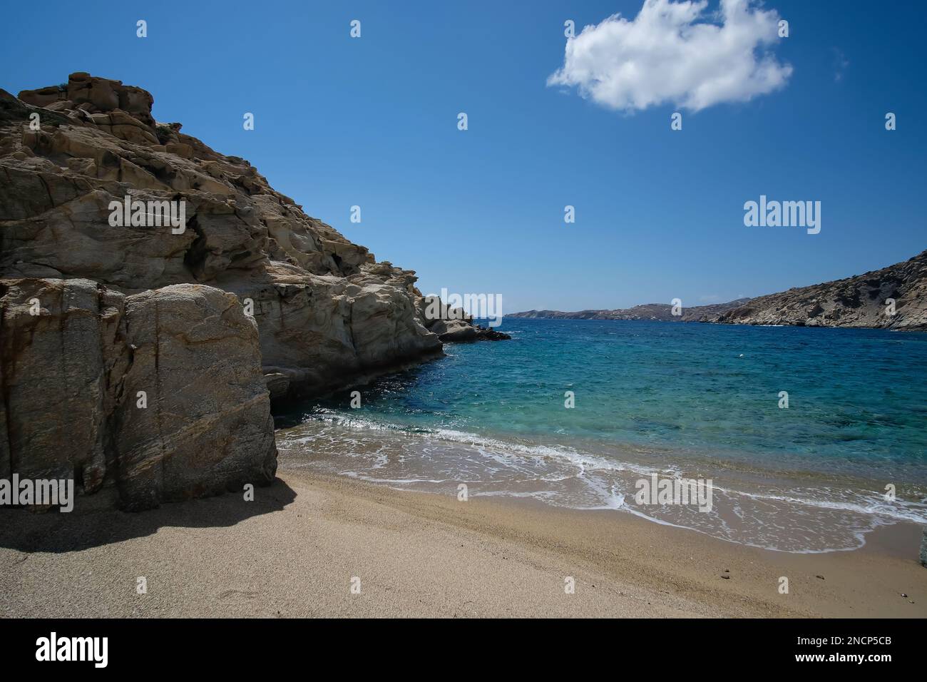 The beautiful turquoise sandy beach of Sapounohoma in Ios Greece Stock ...