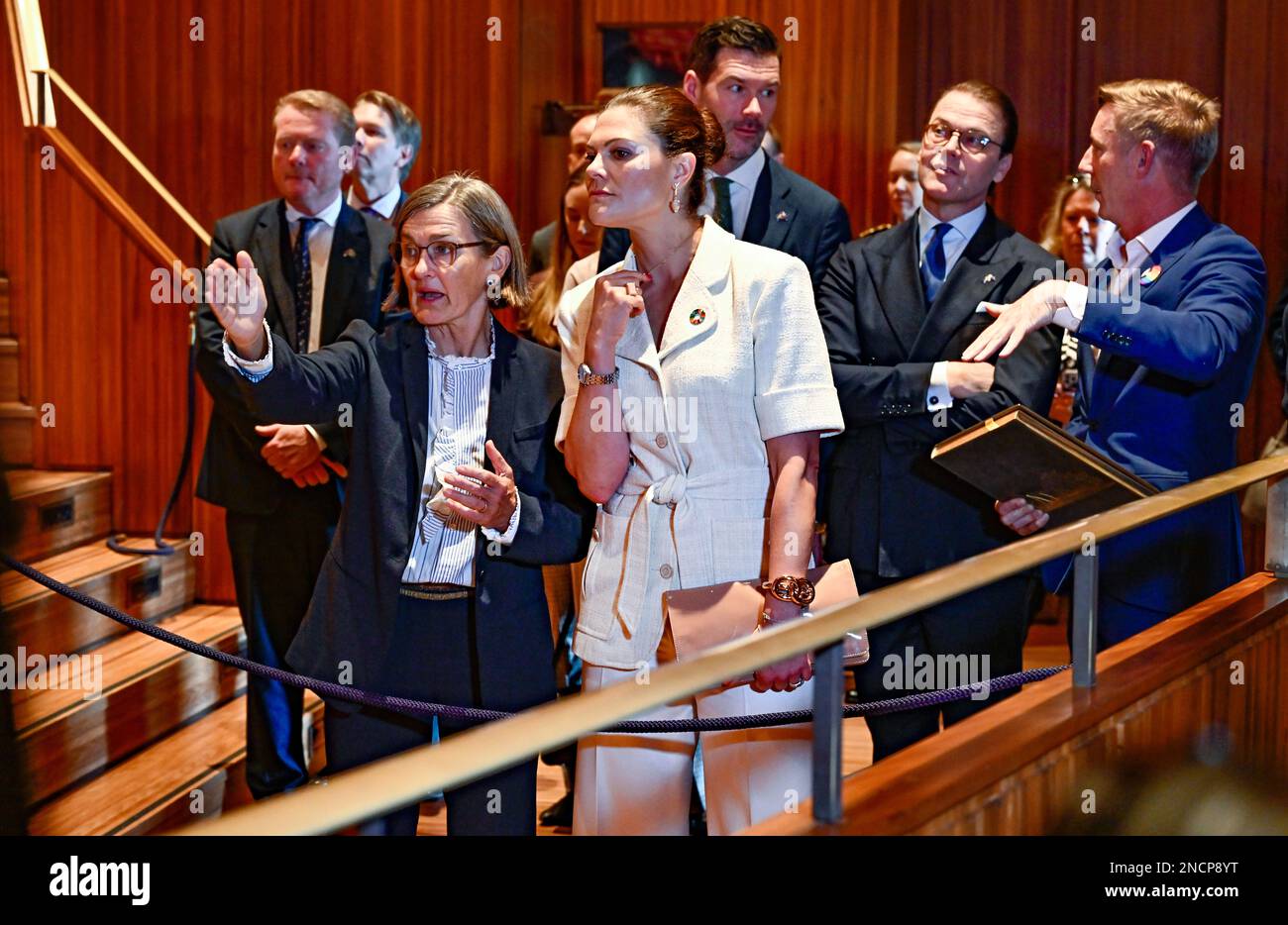 Crown Princess Victoria of Sweden and Prince Daniel are guided by ...