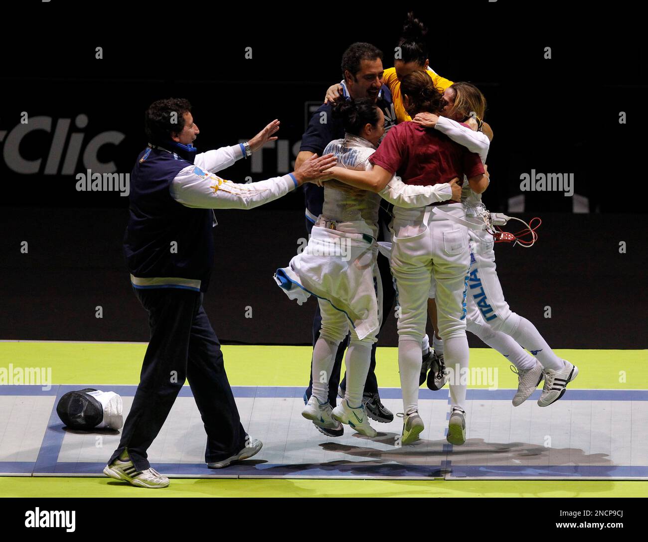 The Italian team celebrates victory over Poland in the women's foil ...
