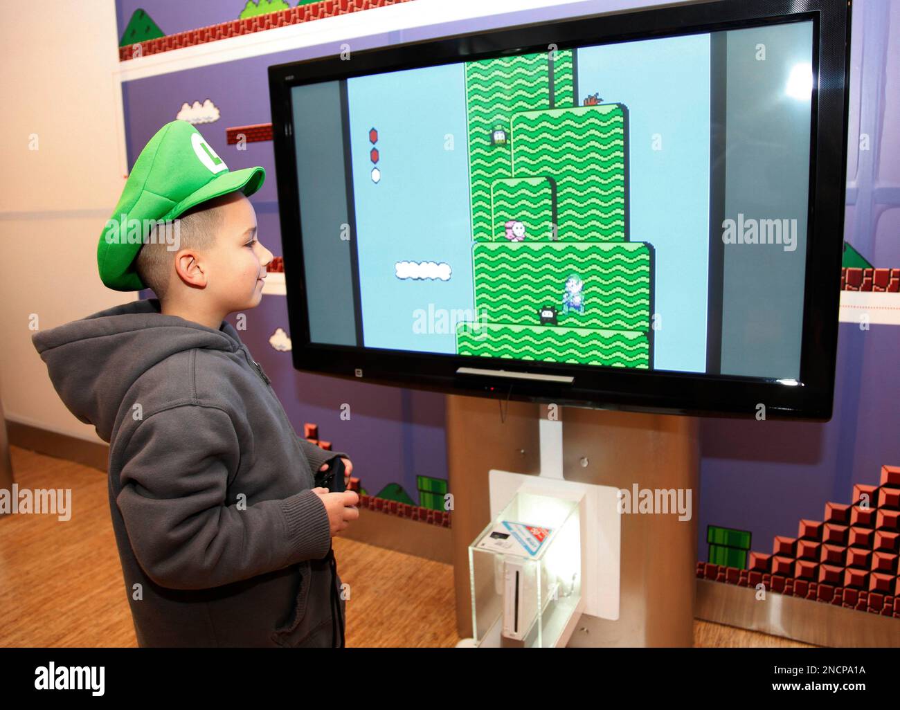 In this photo provided by Nintendo of America, Jake Keller, 6, from ...