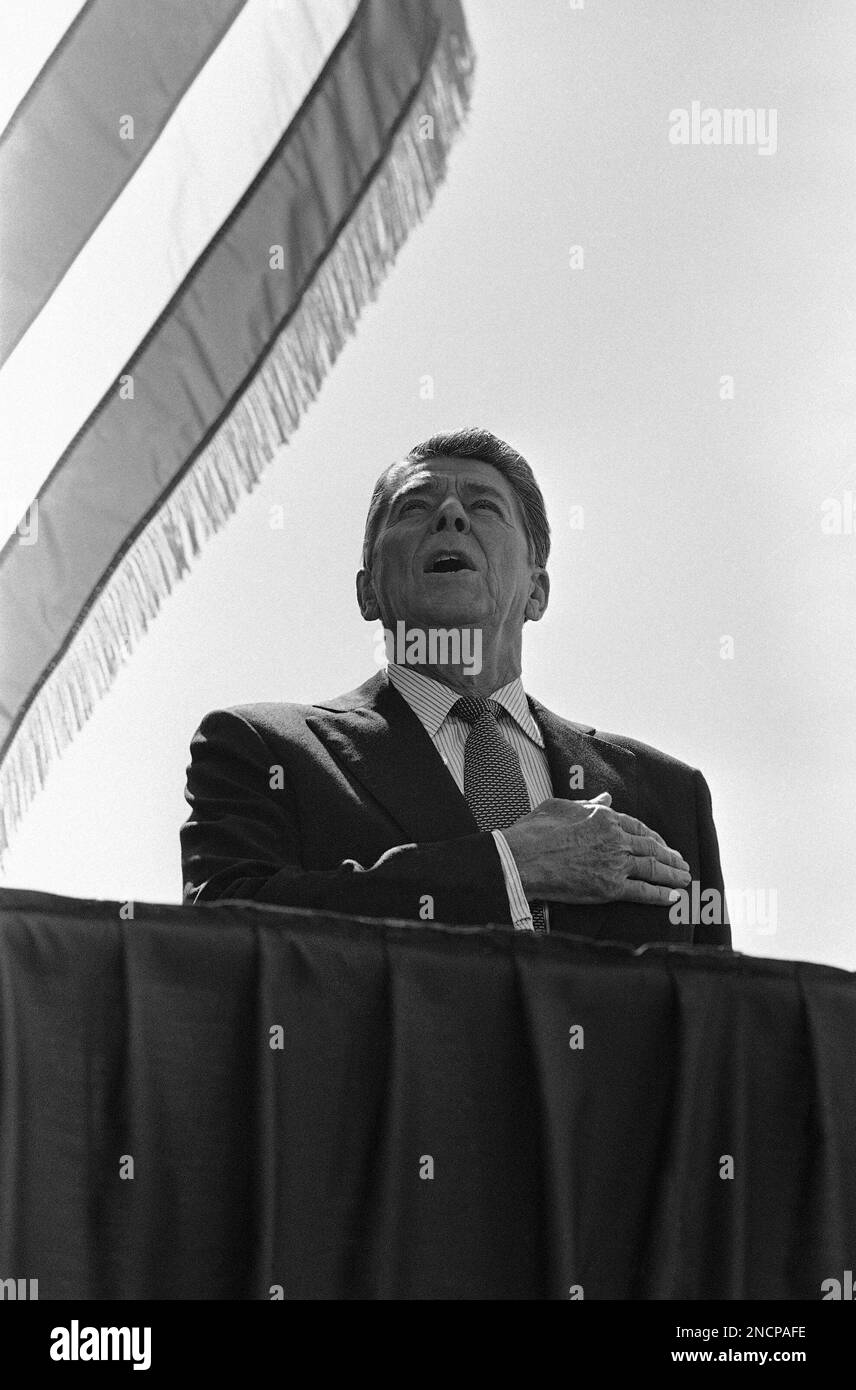 GOP presidential candidate Ronald Reagan salutes the flag during ...