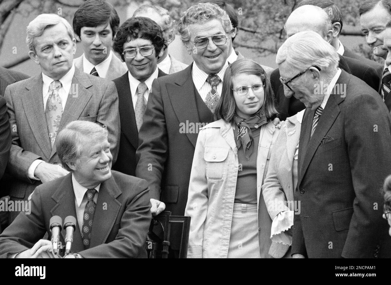 President Jimmy Carter talks with a group in the White House Rose ...