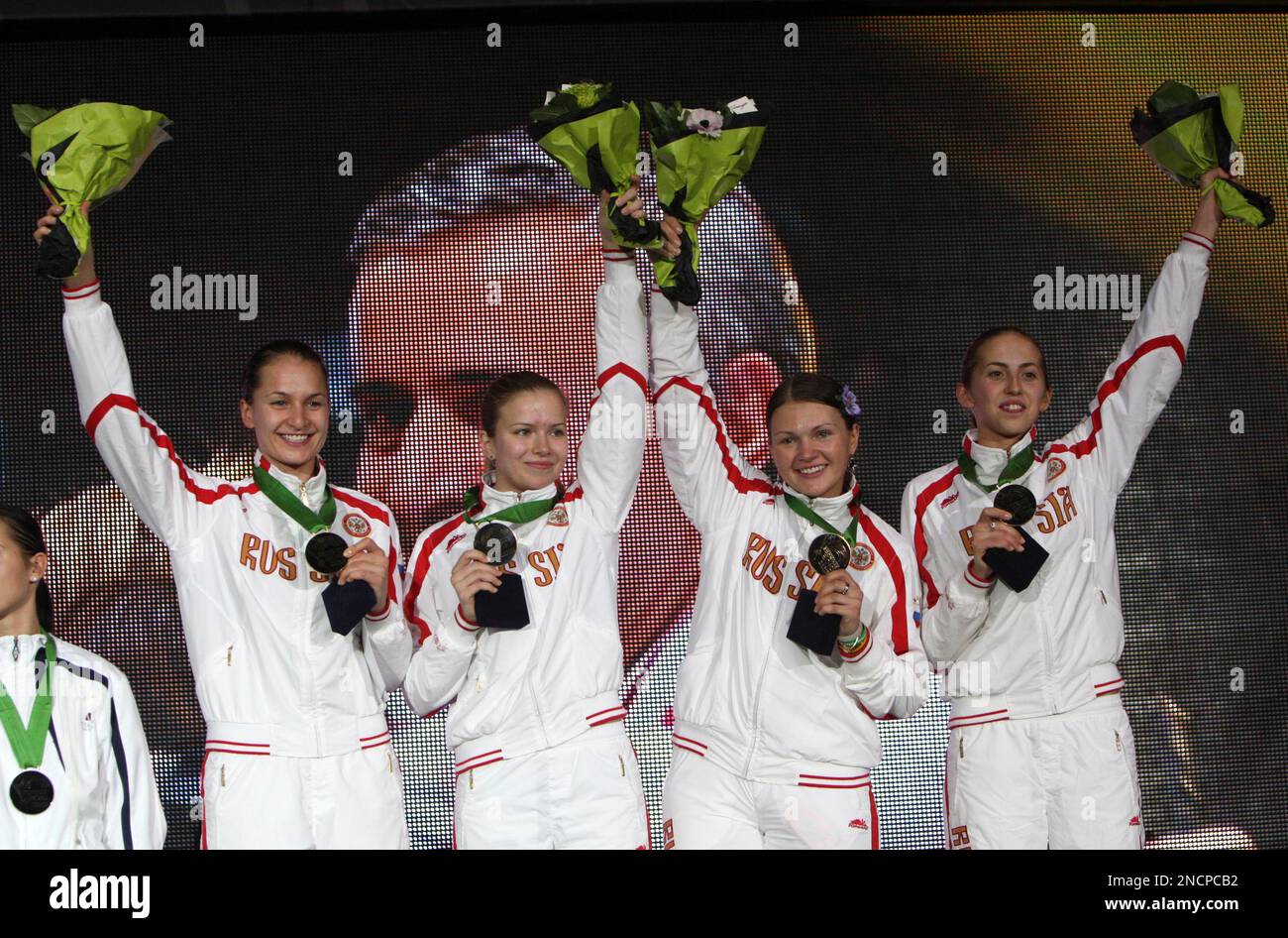 Russian women's team sabre celebrates its gold medal during the fencing ...