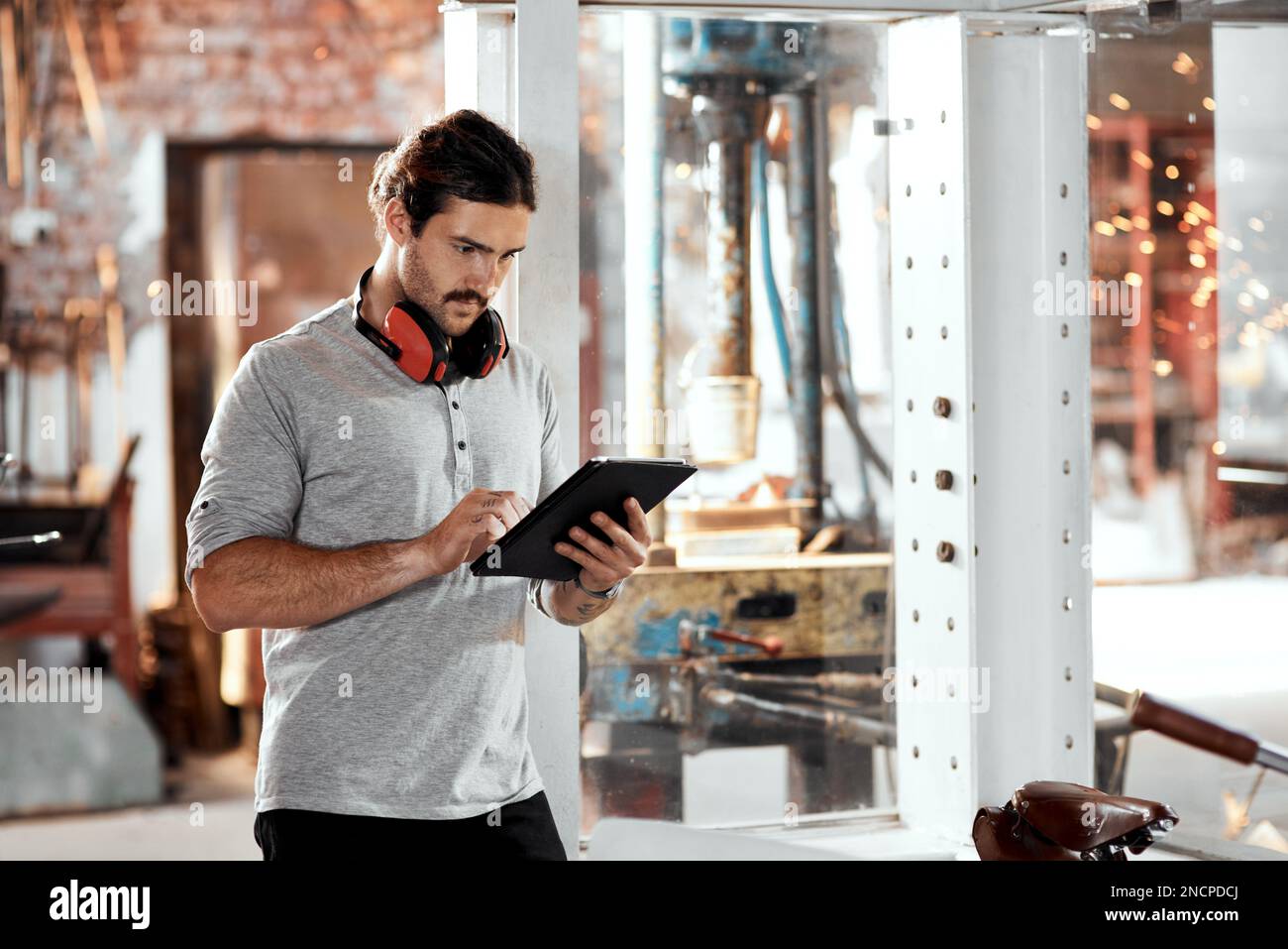 Technology is every budding entrepreneurs friend. a handsome young ...