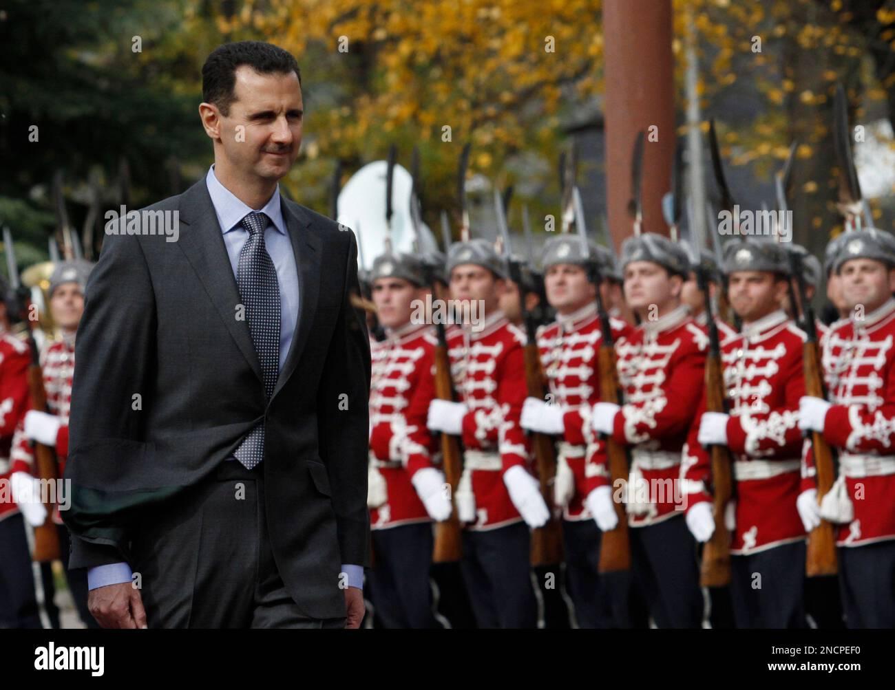 Syrian President Bashar al-Assad review Bulgarian honor guard during ...