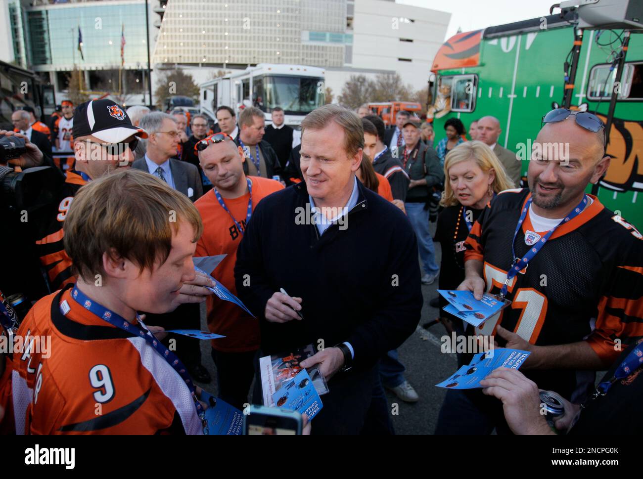 NFL commissioner Roger Goodell signs autographs for tailgaters outside ...