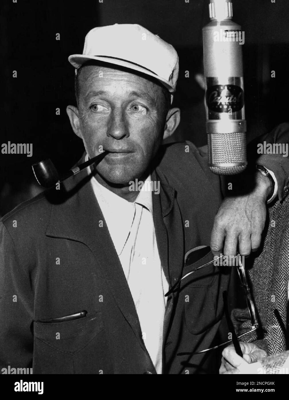 FILE - In this 1958 file photo Bing Crosby is shown during a recording ...