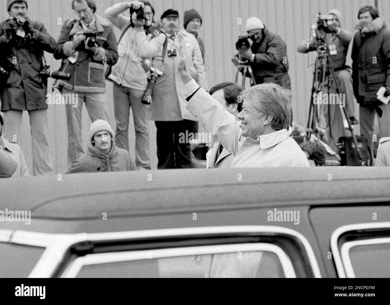 President Jimmy Carter waves on his arrival in St. Louis, Nov. 27, 1978 ...