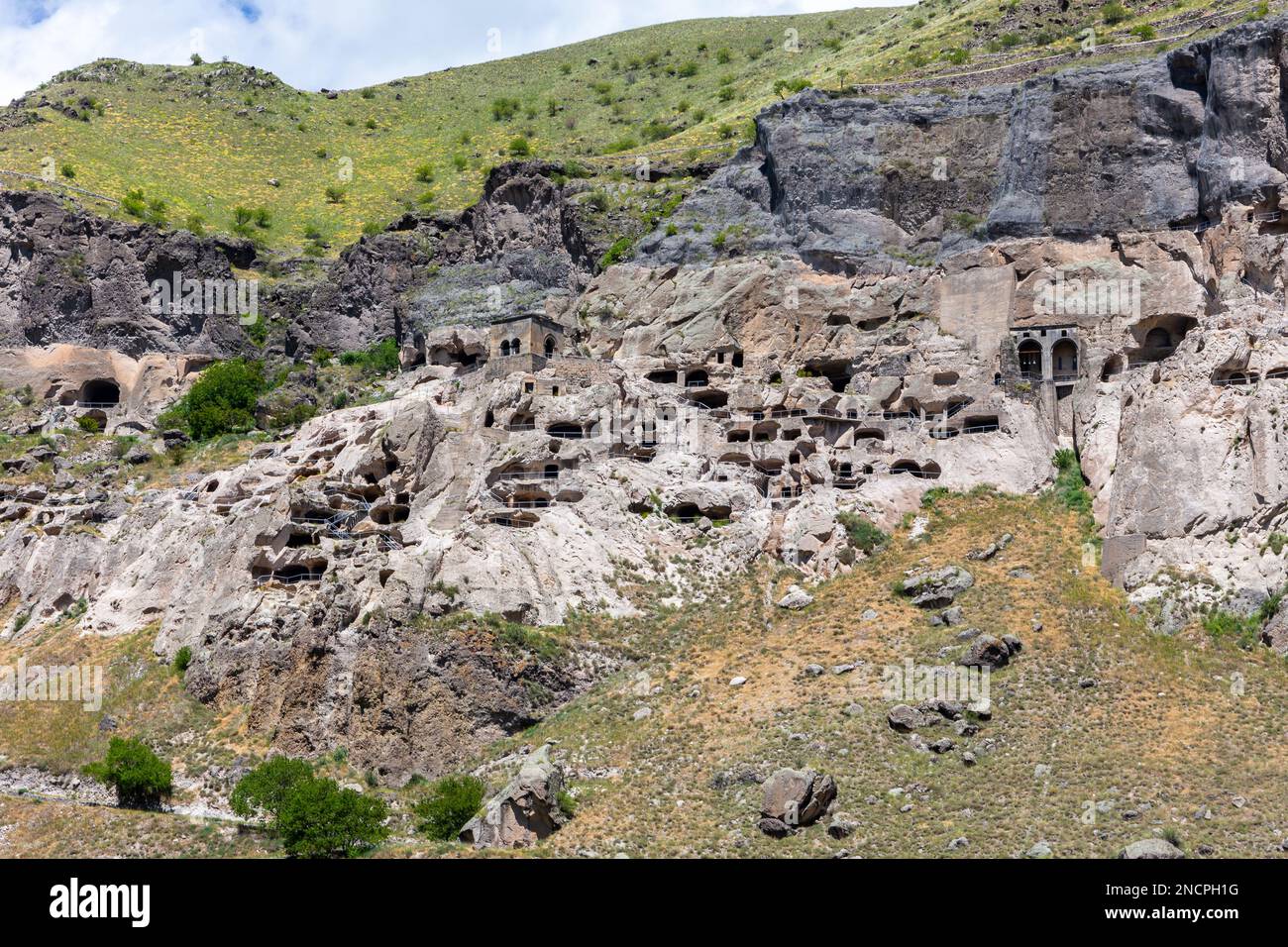 Vardzia cave monastery complex in Georgia landscape, mountain slope ...