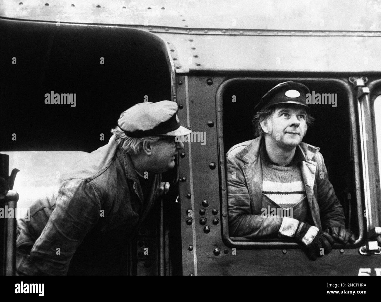 Driver Geoff Fillingham, left, and Fireman Mike Kirkland, peer from the ...