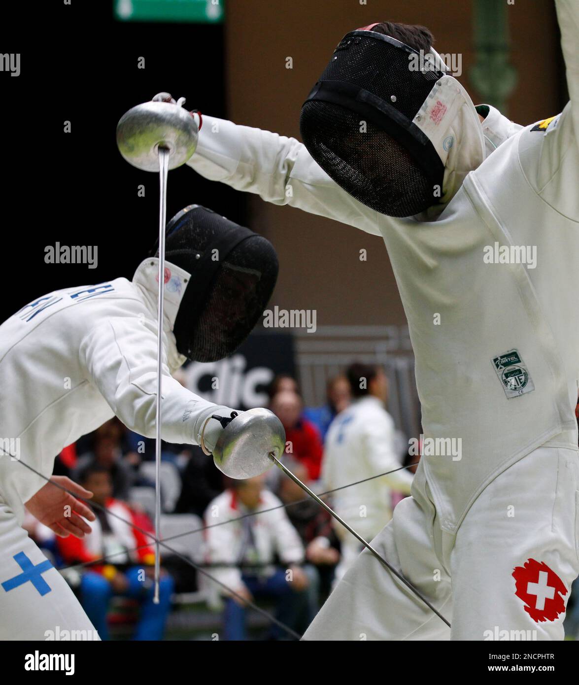 Switzerland's Max Heinzer, right, competes with Finland's Alexender ...