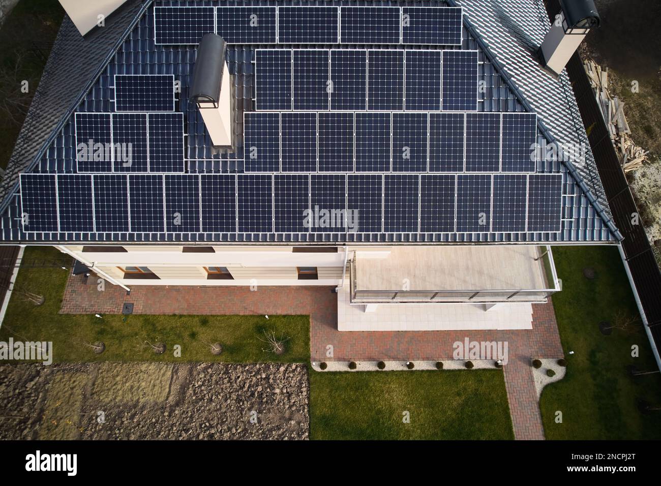 Aerial drone photography of autonomous house with photovoltaic solar ...