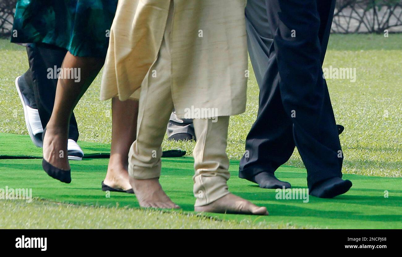 U.S. President Barack Obama, right, and first lady Michelle Obama, left ...