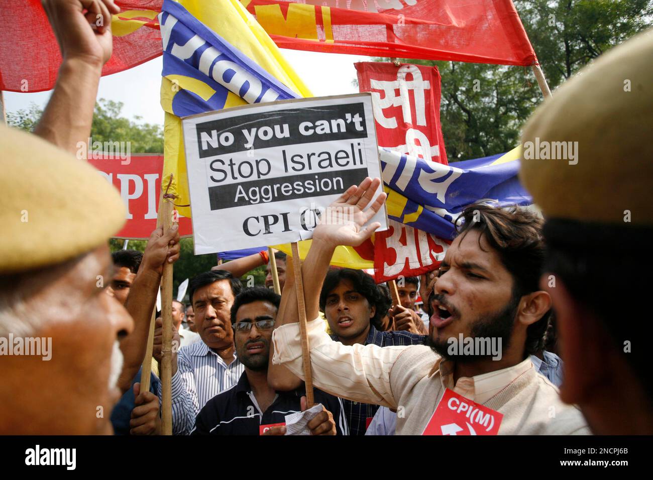 Activists of Communist Party of India (Marxist) raise slogans at a ...