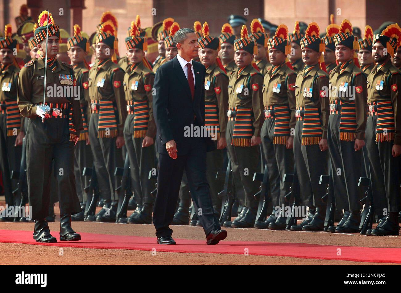 U.S. President Barack Obama inspects the guard of honor during a ...