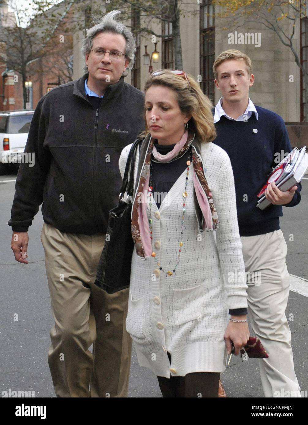 Dr. William A. Petit Jr., left, leaves with his sister Johanna Chapman ...