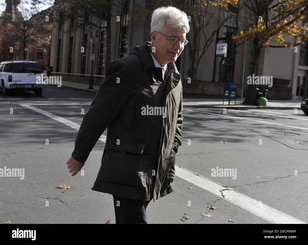 Judge Jon C. Blue leaves from a break in jury deliberations in the ...
