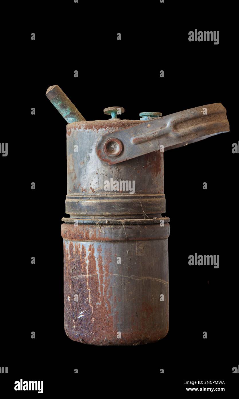 Old rusty carbide lamp. Acetylene gas lamps. Isolated over black Stock ...