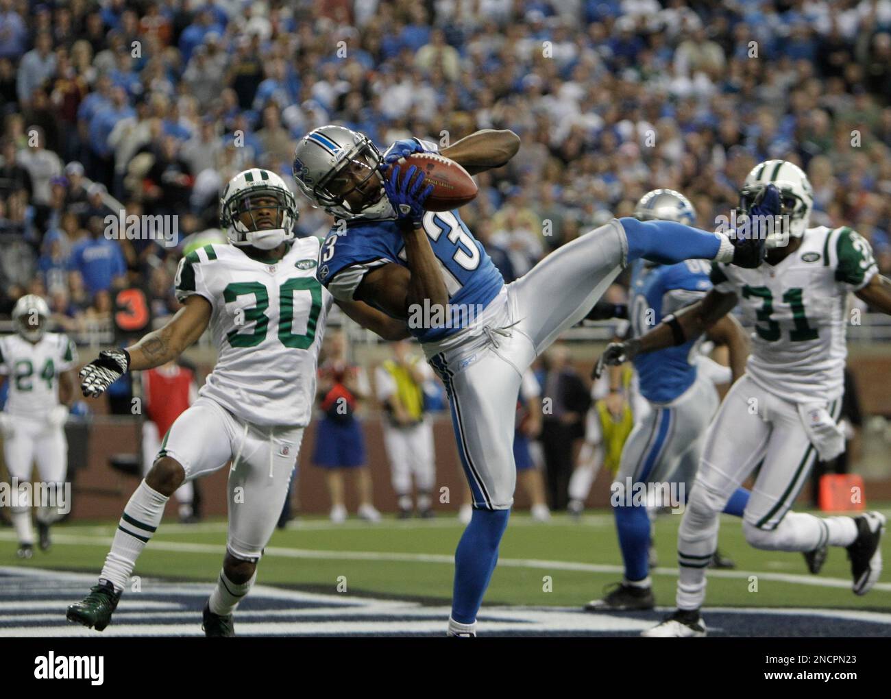 Detroit Lions wide receiver Nate Burleson (13) catches a 2-yard ...