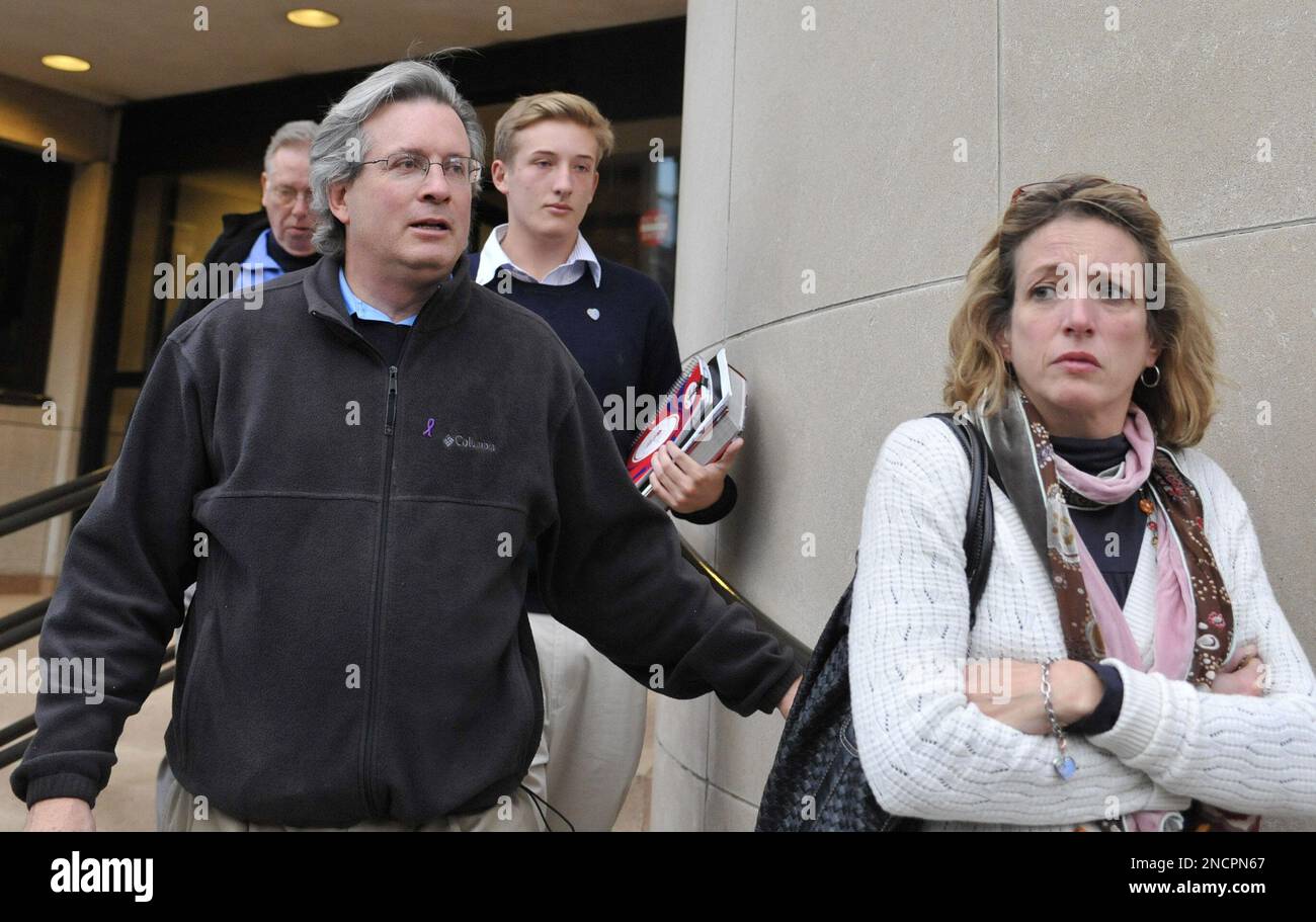 Dr. William A. Petit Jr., left, leaves with his sister Johanna Chapman ...