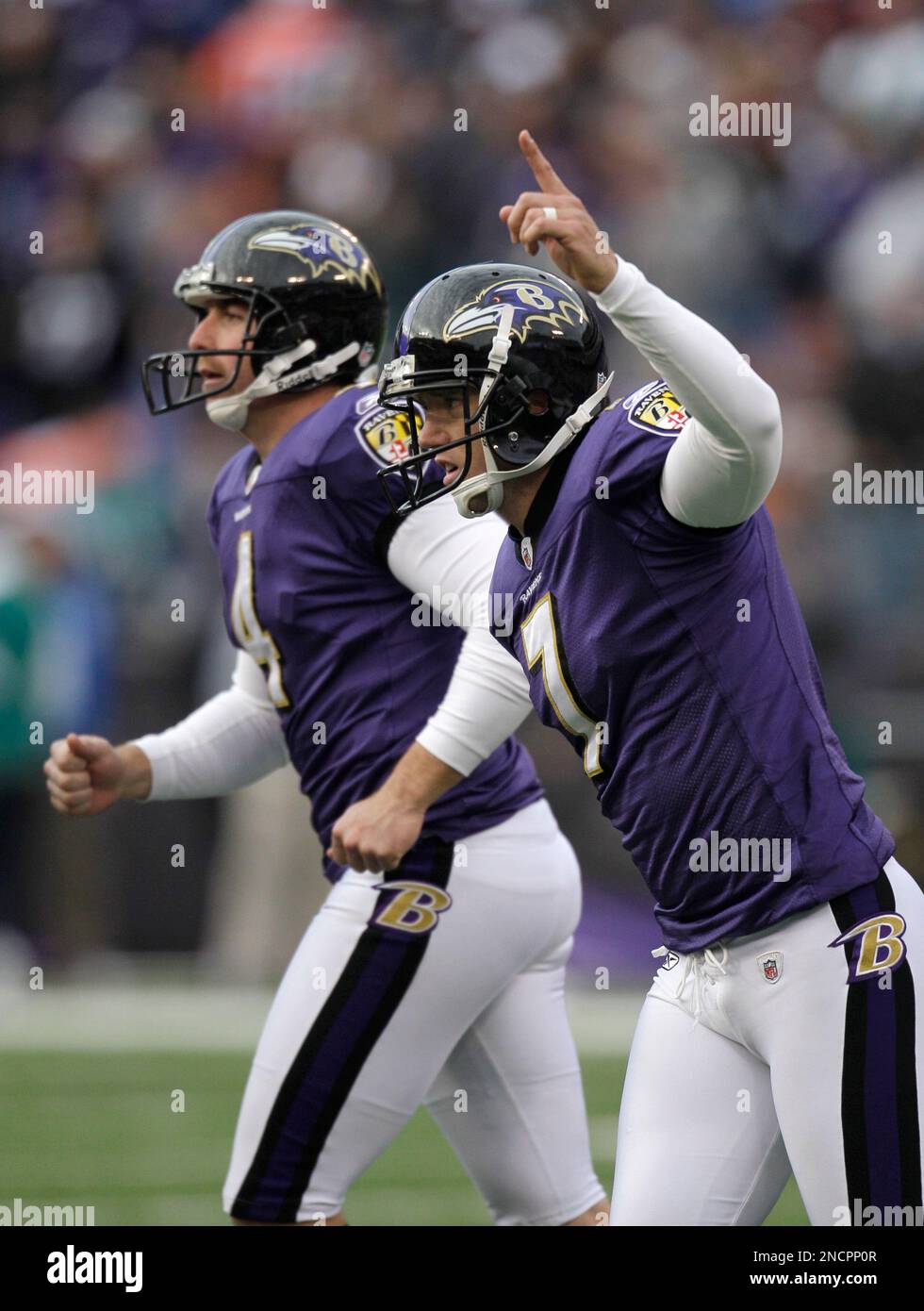Baltimore Ravens place kicker Billy Cundiff (7) and holder Sam Koch ...