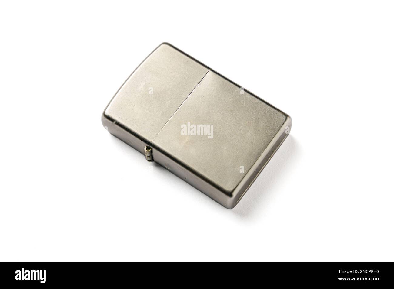 Metal gasoline lighter on a white background Stock Photo - Alamy
