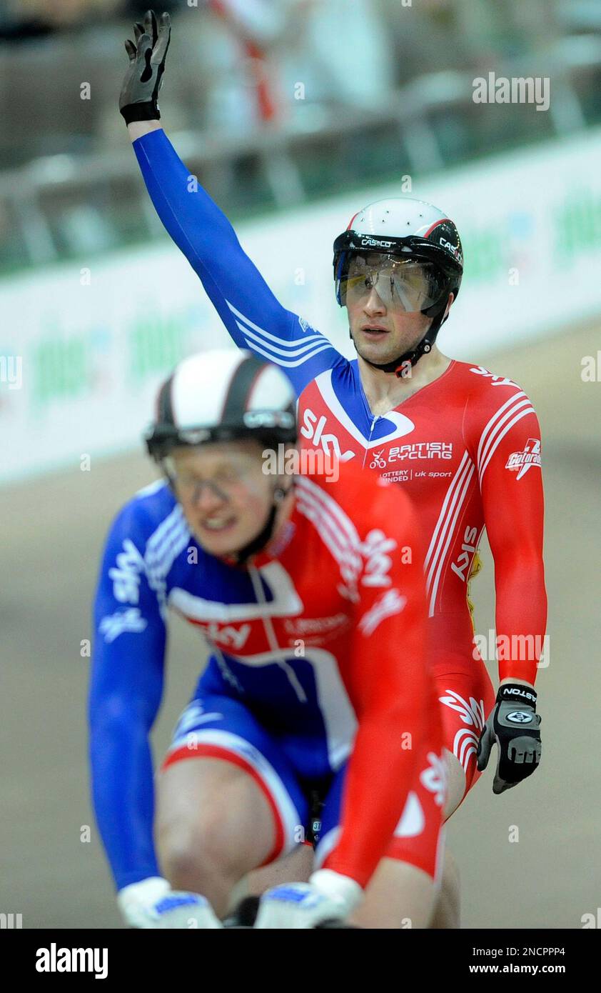 Britain's Jason Kenny, right, celebrates riding behind teammate Matthew ...