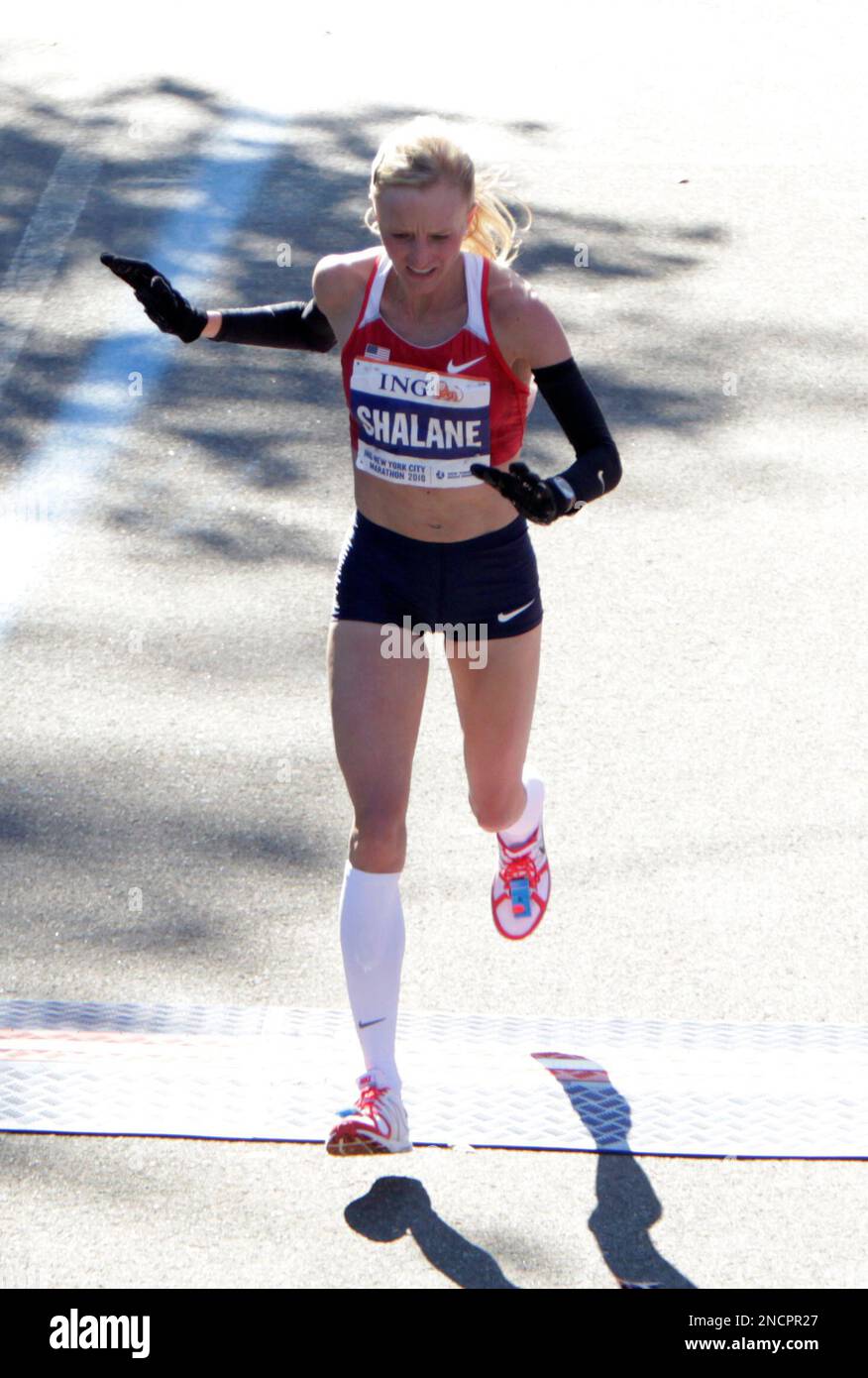 Shalane Flanagan, of the United States, crosses the finish line in ...