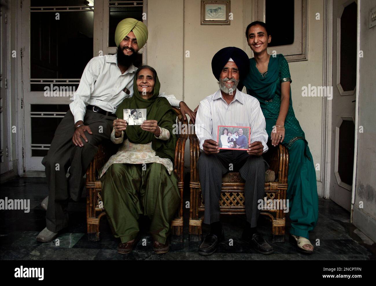 Paramjit Singh, front right, first cousin of Nikki Haley, who won ...