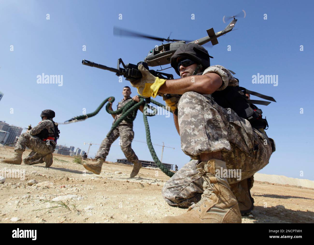 Lebanese special forces soldiers perform an exercise at the end of ...