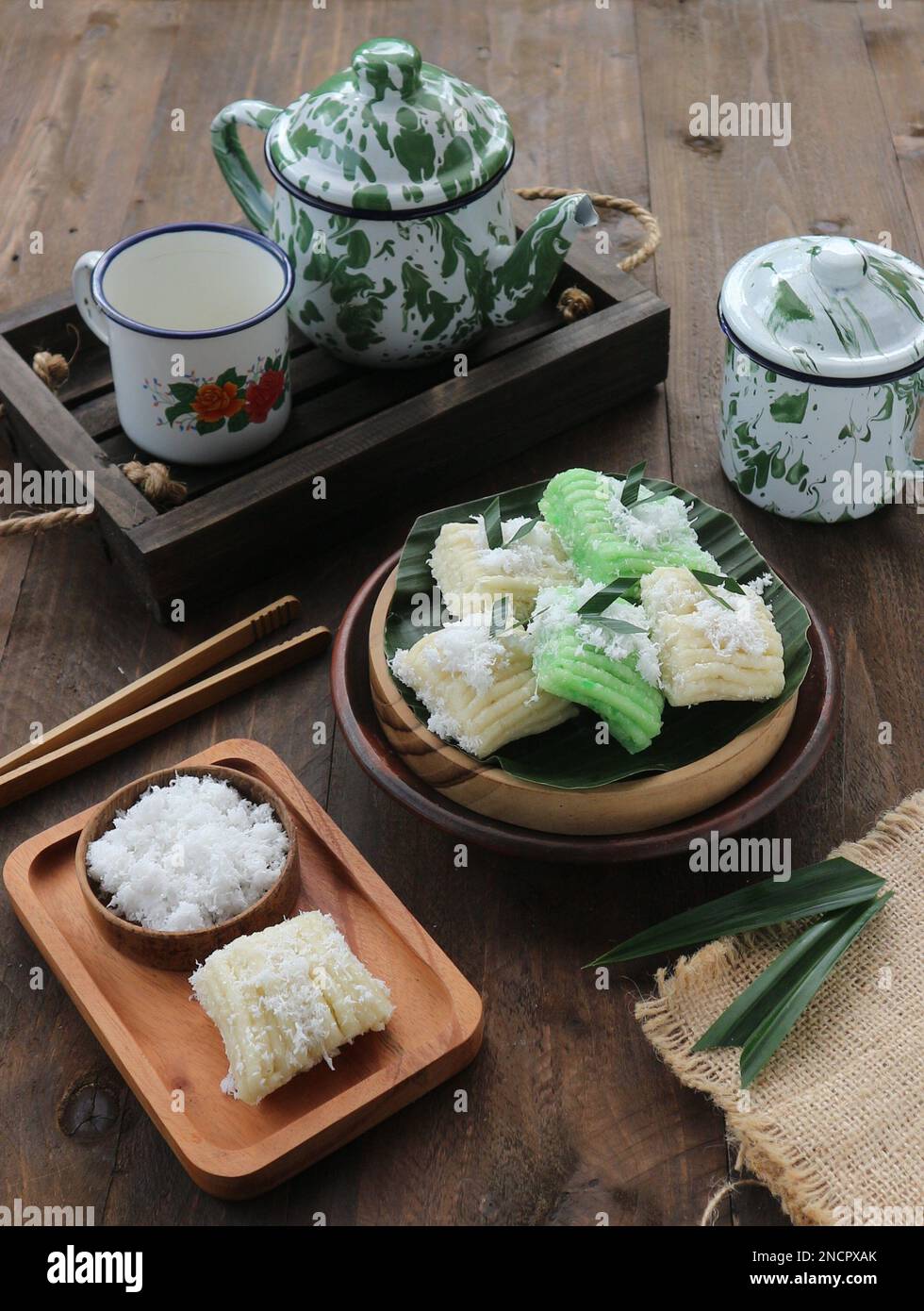 a cake dish made from processed cassava sprinkled with grated coconut ...