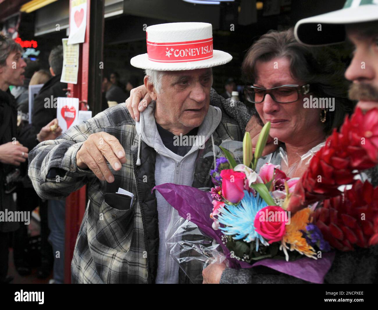 A longtime patron of Ruby's Bar & Grill Jim Shannon, left, tries to ...