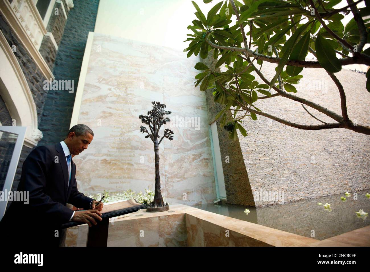 U.S. President Barack Obama signs the guest book as he visits the ...