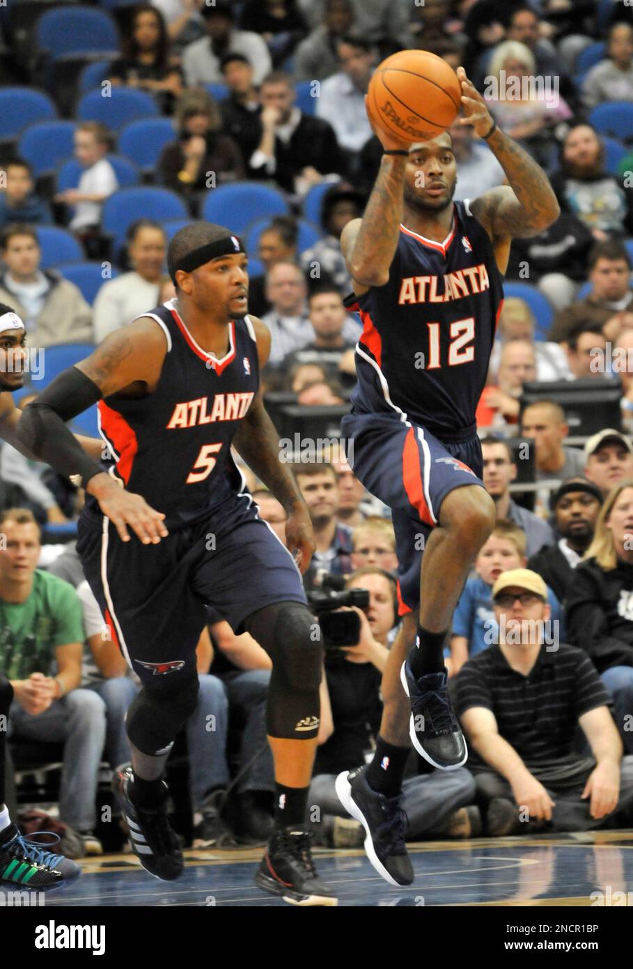 Atlanta Hawks' Josh Smith (5) and Josh Powell in the second half of an ...
