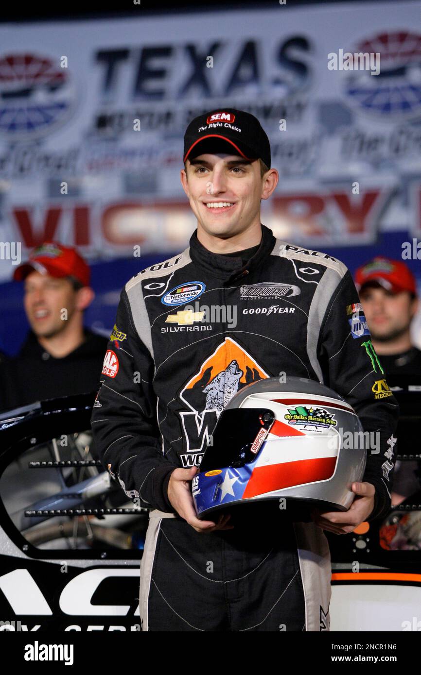 NASCAR Nationwide Series driver James Buescher holds the O'Reiily Auto ...