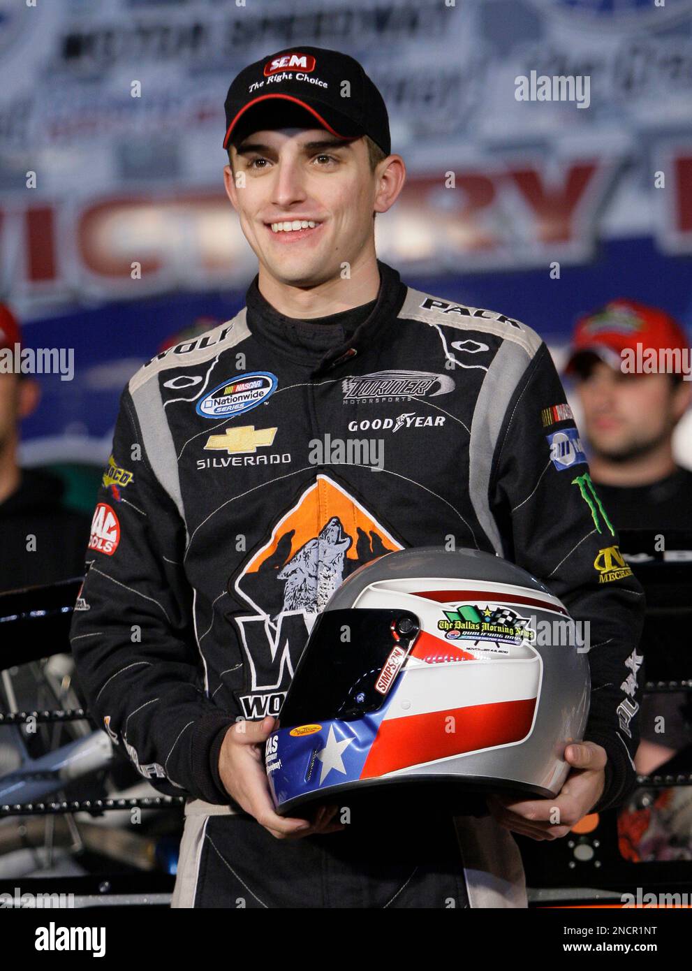 NASCAR Nationwide Series driver James Buescher holds the O'Reiily Auto ...