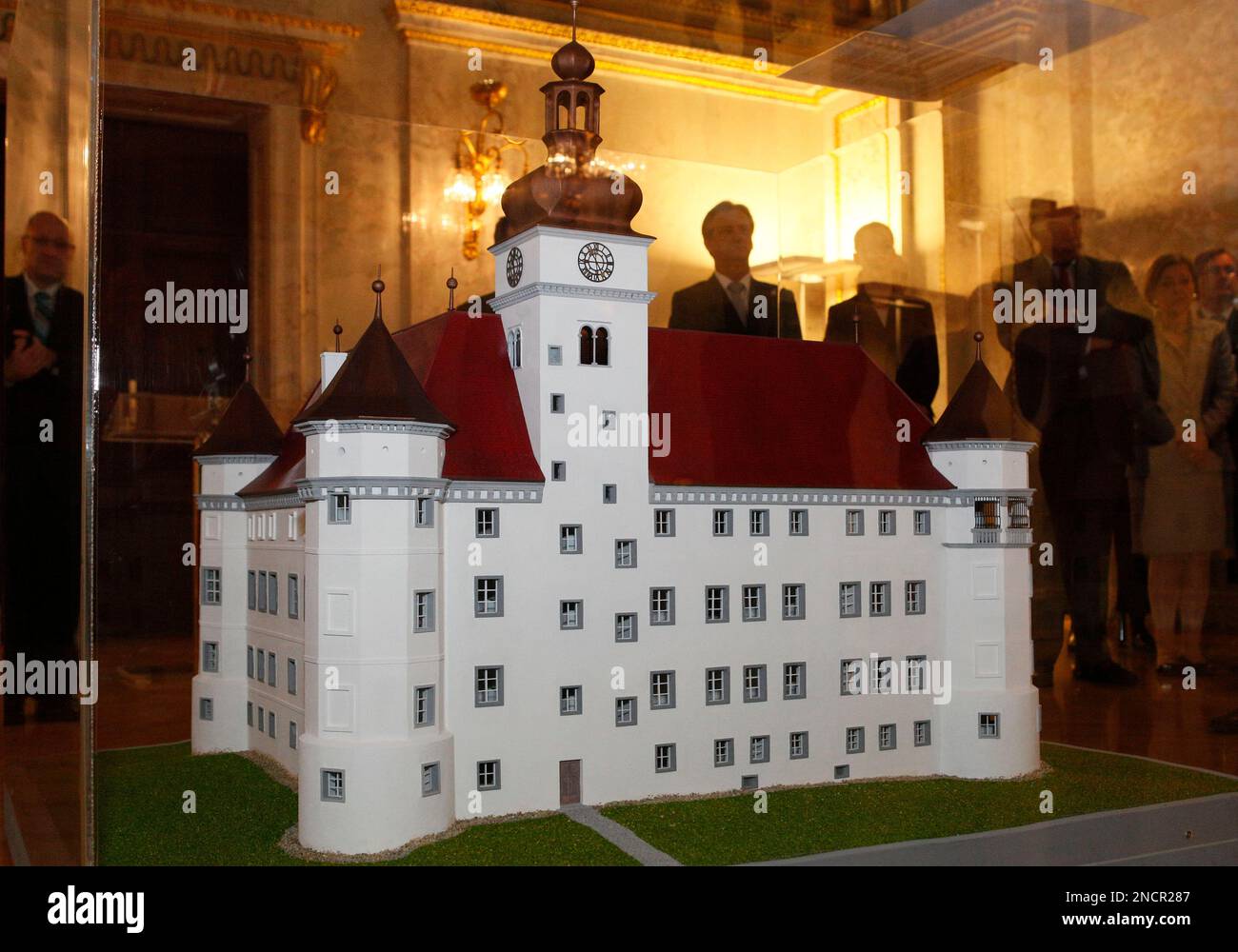 A model of Hartheim Castle is presented during a ceremony in the ...