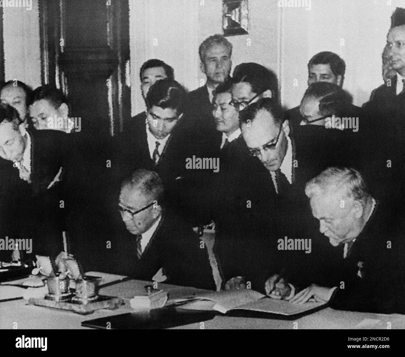 Japanese premier Ichiro Hatoyama, seated left, and Soviet premier ...