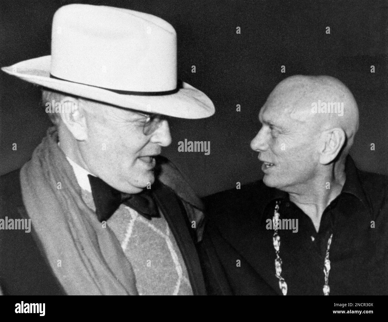 Author Truman Capote chats with actor Yul Brynner at Studio 54 in New ...