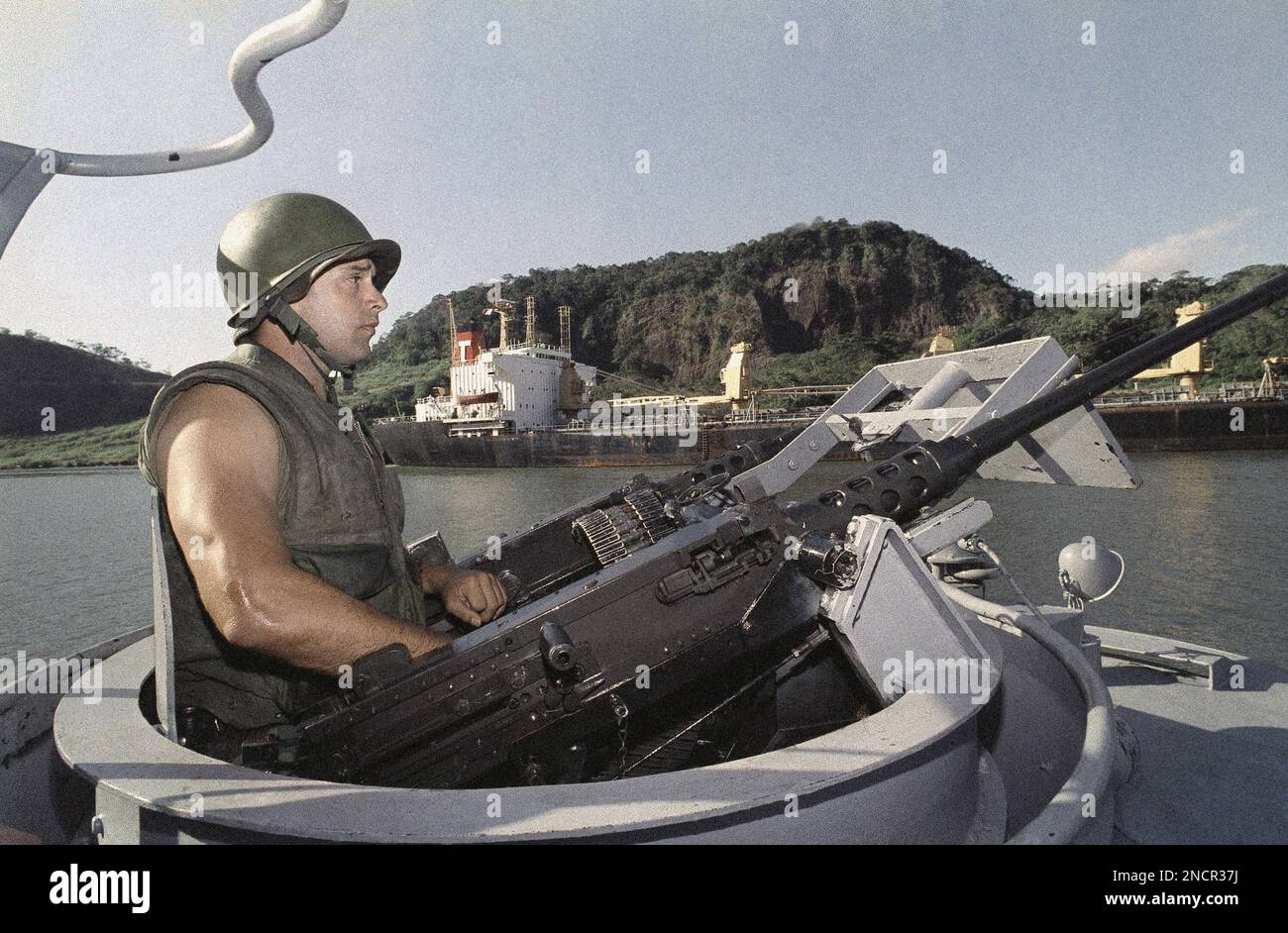 Navy Gunner’s Mata Elliot Torres of New Orleans man a twin 50 caliber ...