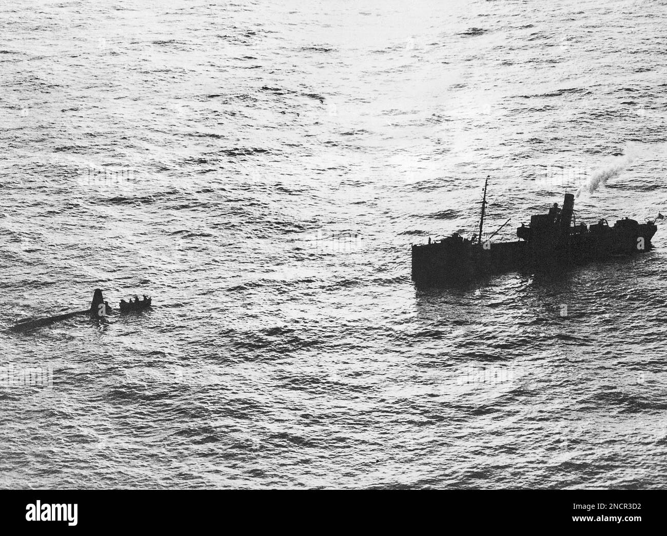 In this British Official Photo, a boat from a trawler picking up the ...