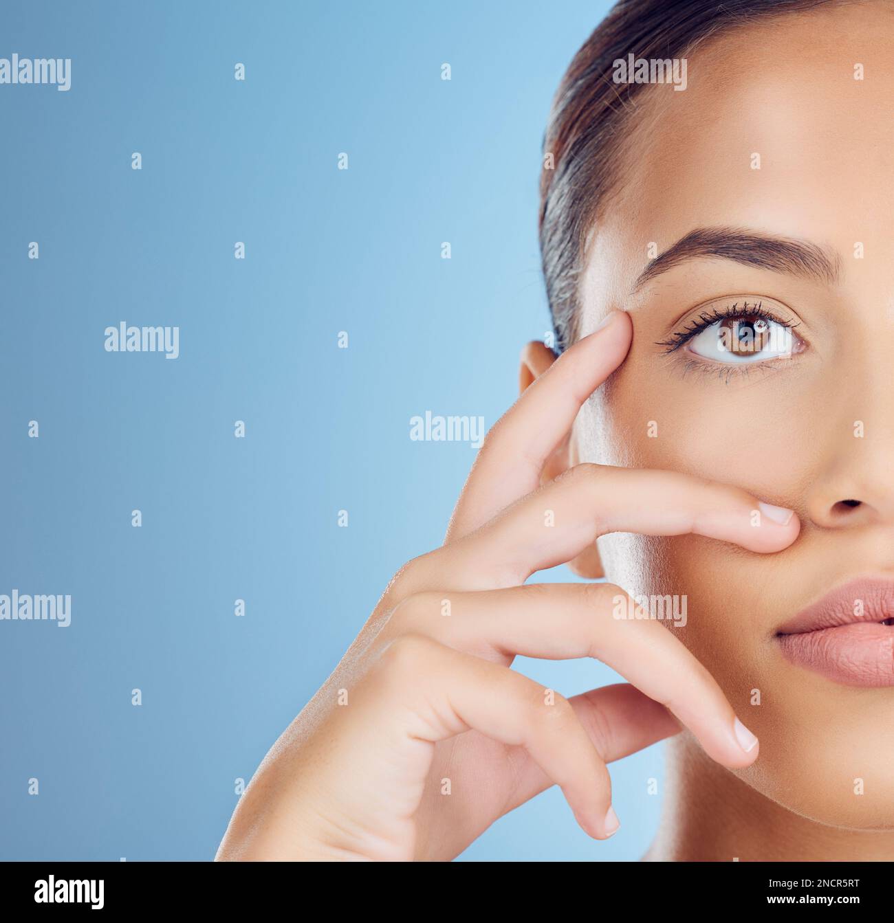 Half face, woman and beauty in mockup studio for skincare, wellness and ...
