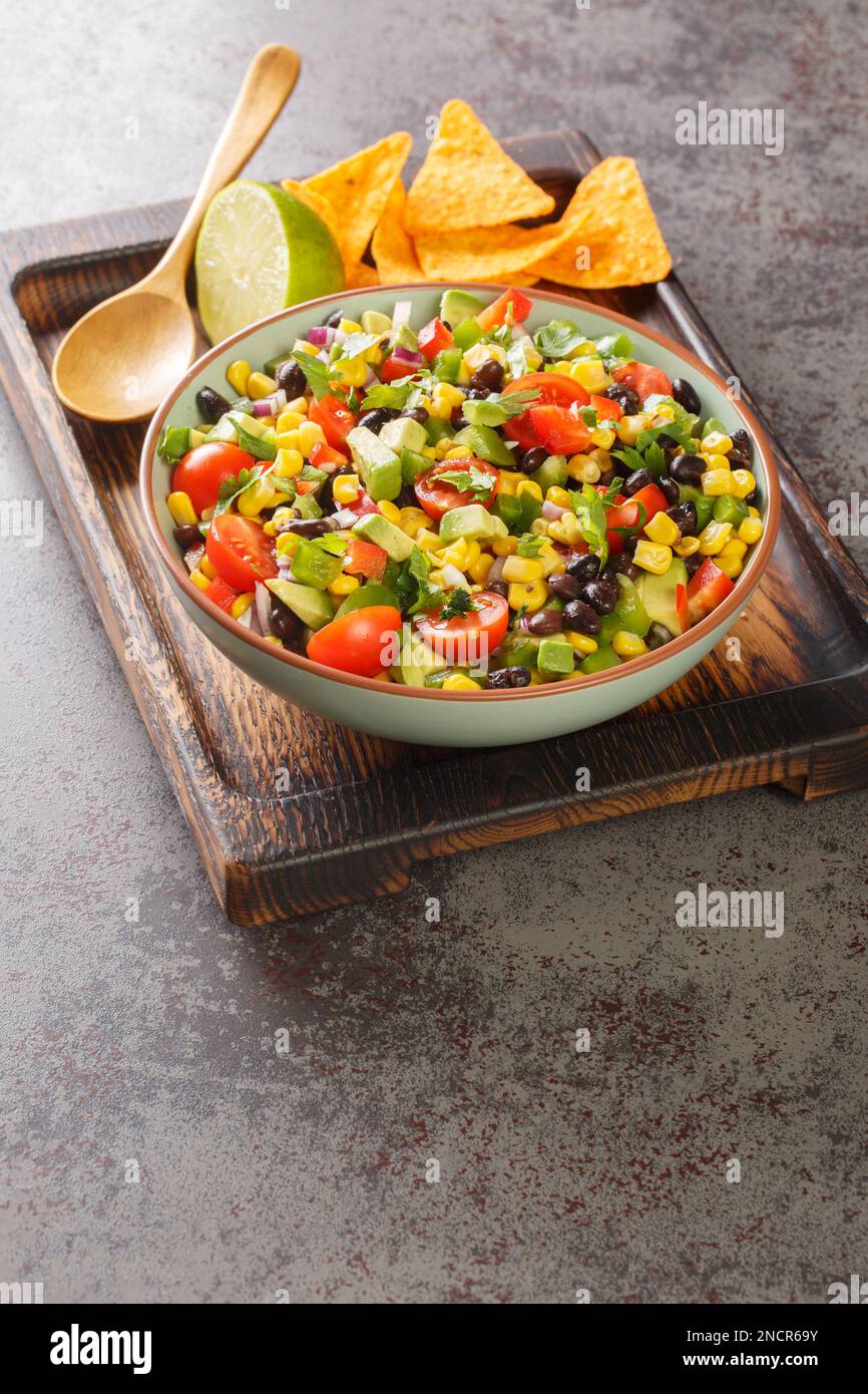 Cowboy caviar or texas caviar salad dip with black bean, tomatoes ...