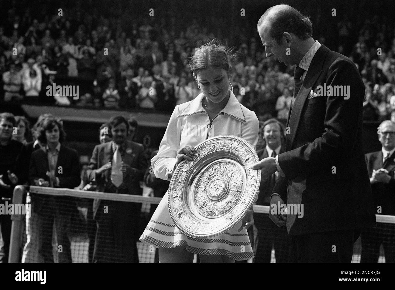 A smile from American tennis player Chris Evert, as Britain's Prince ...