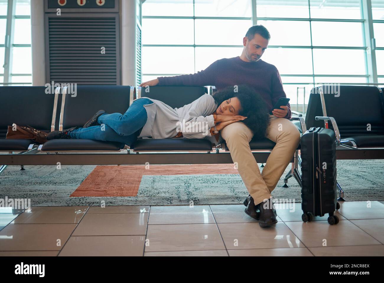 Young couple sleeping on bench hi-res stock photography and images - Alamy