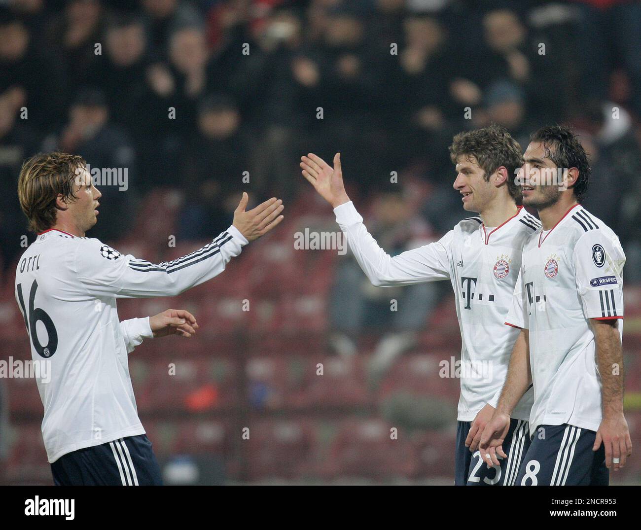 Bayern Munich's Thomas Muller, second from right, celebrates scoring ...